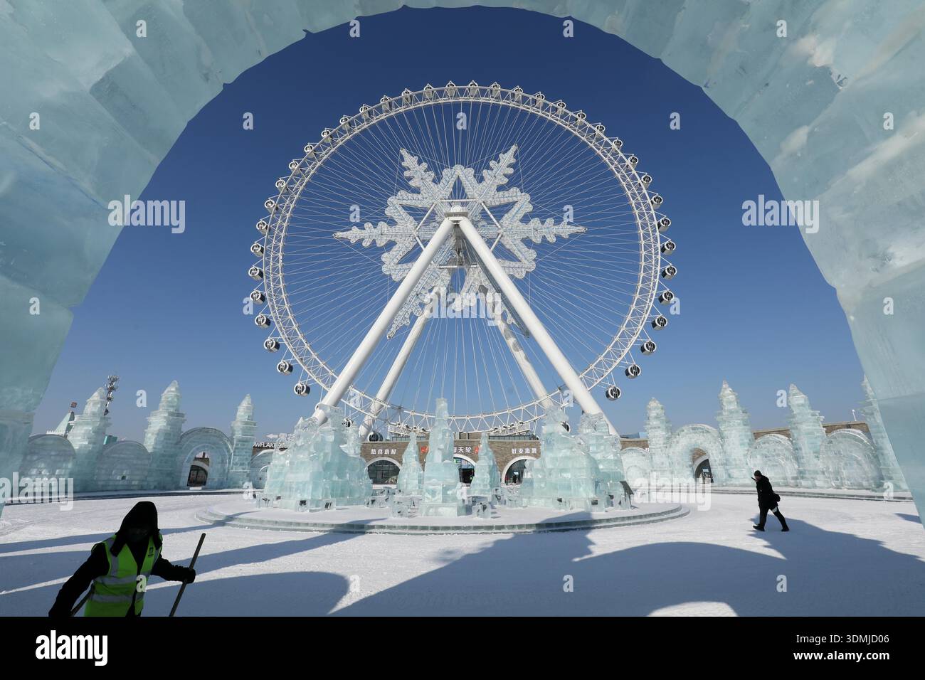Visitors enjoy the 27th Harbin Ice and Snow World despite the cold ...