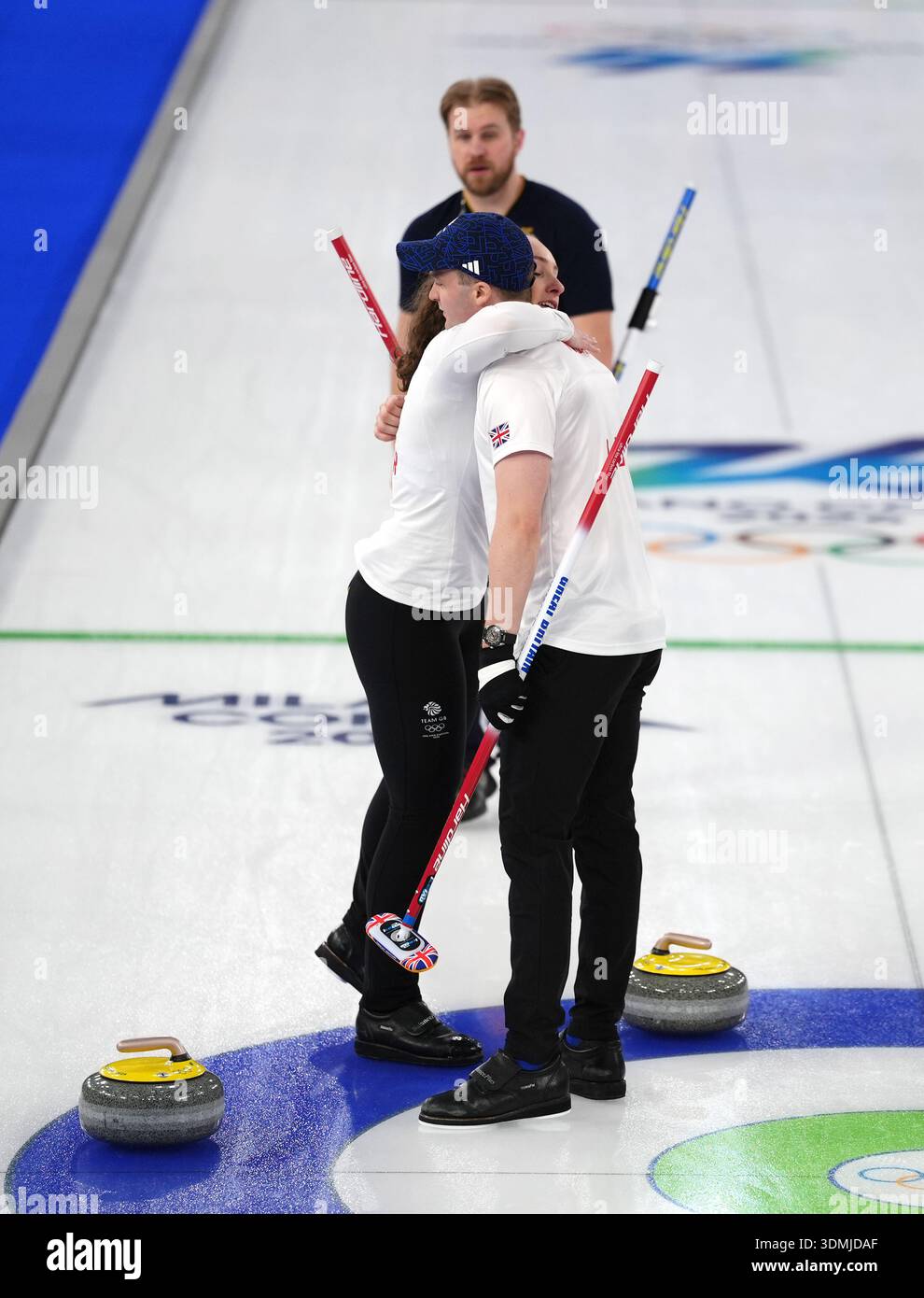 Great Britain's Jennifer Dodds (left) and Bruce Mouat celebrate ...