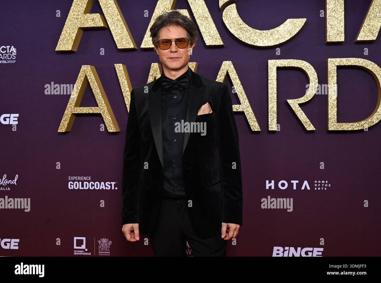 Jack Christian is seen posing for a photo on the red carpet at the 2024 ...