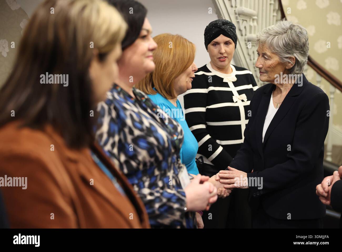 President of Ireland Catherine Connolly speaking to community workers ...