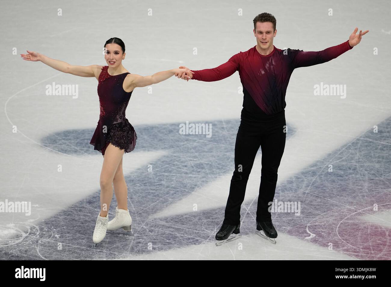 Lia Pereira and Trennt Michaud of Canada compete during the figure ...