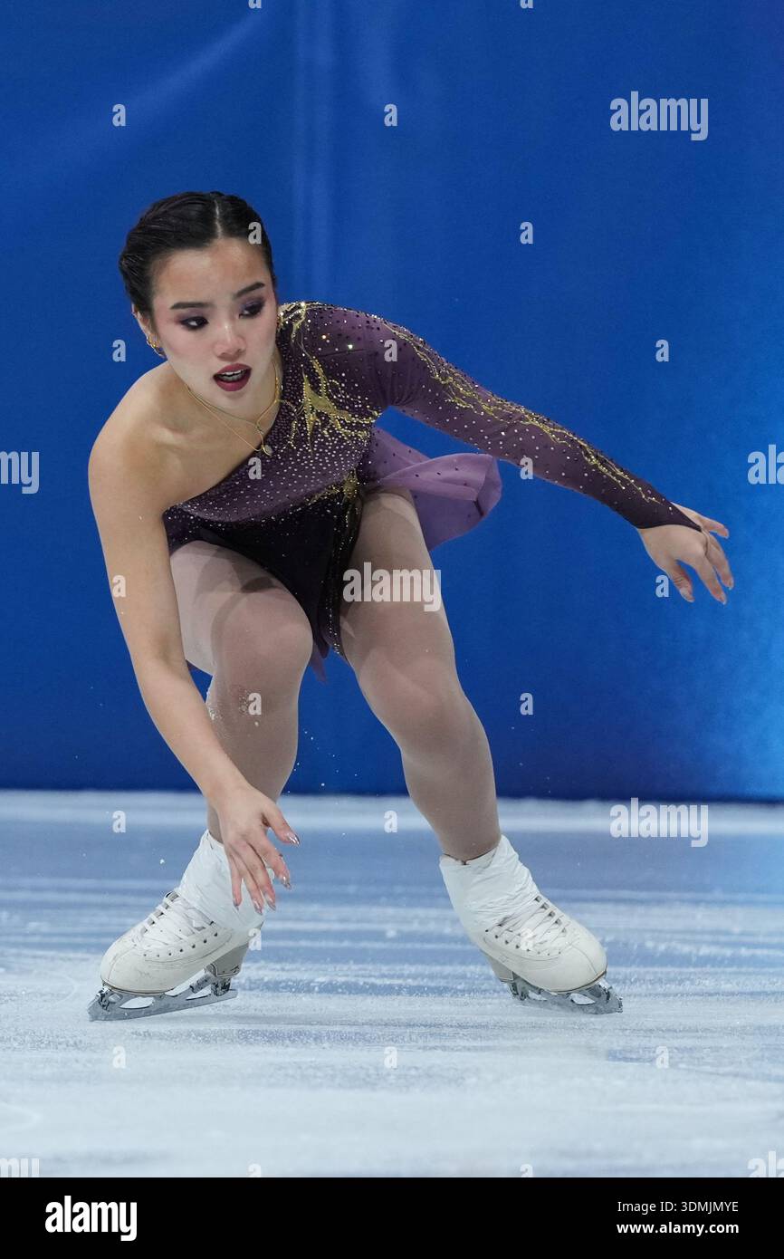 Ellie Kam falls while competing with her partner Danny O'Shea of the ...