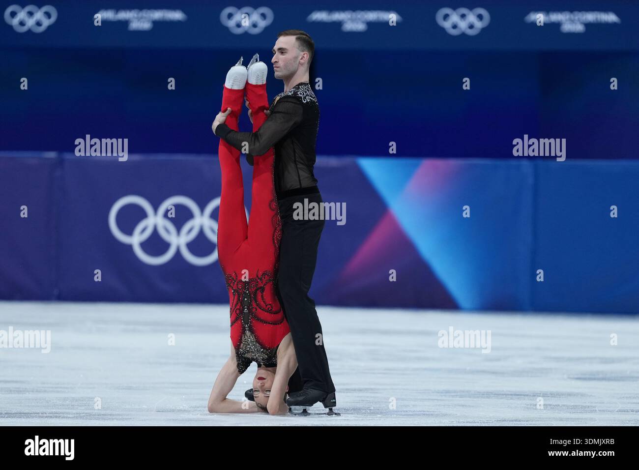 Anastasiia Metelkina and Luka Berulava of Georgia compete during the ...