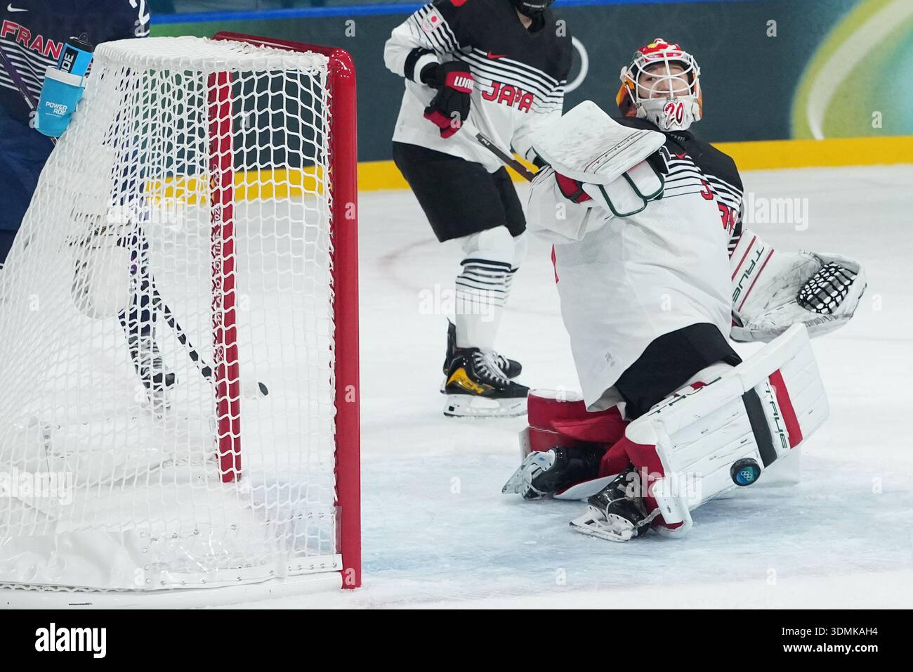 Japan's Miyuu Masuhara, center, fails to make a save during a ...