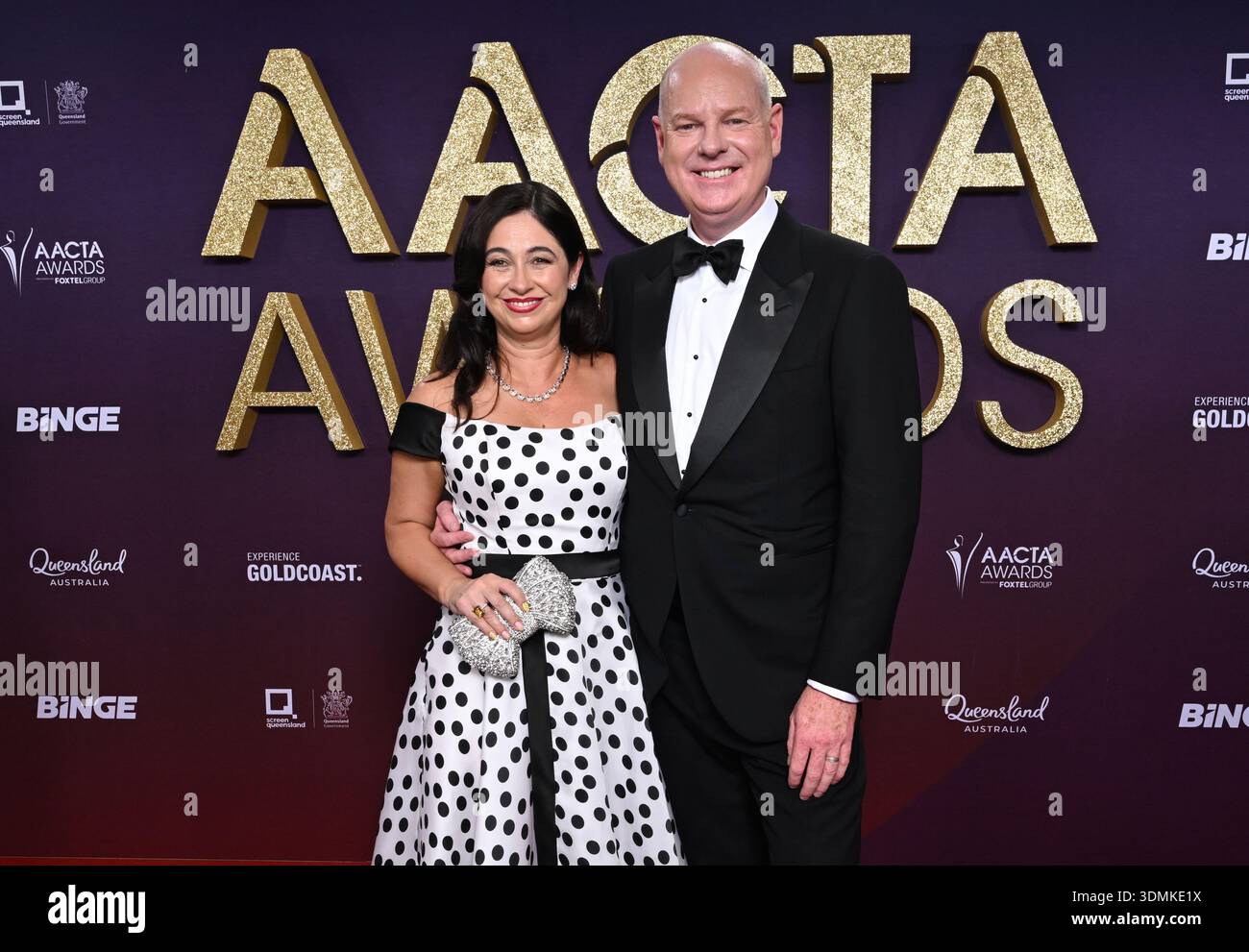 Ellie Parker and Tom Gleeson seen posing for a photo on the red carpet ...
