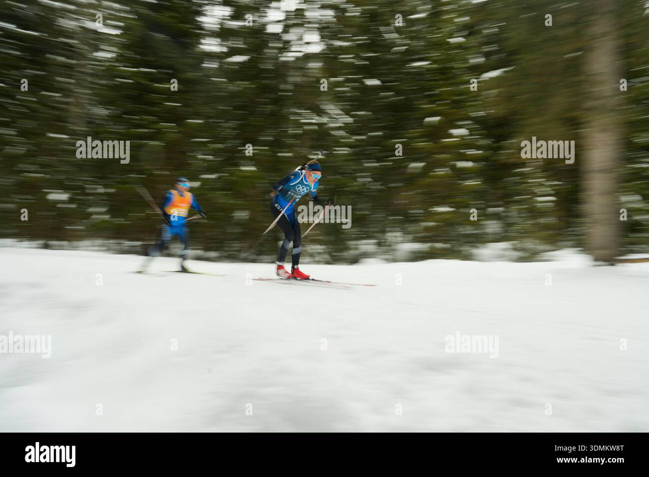 Jakob Kulbin, of Estonia, right, participates in a biathlon training ...