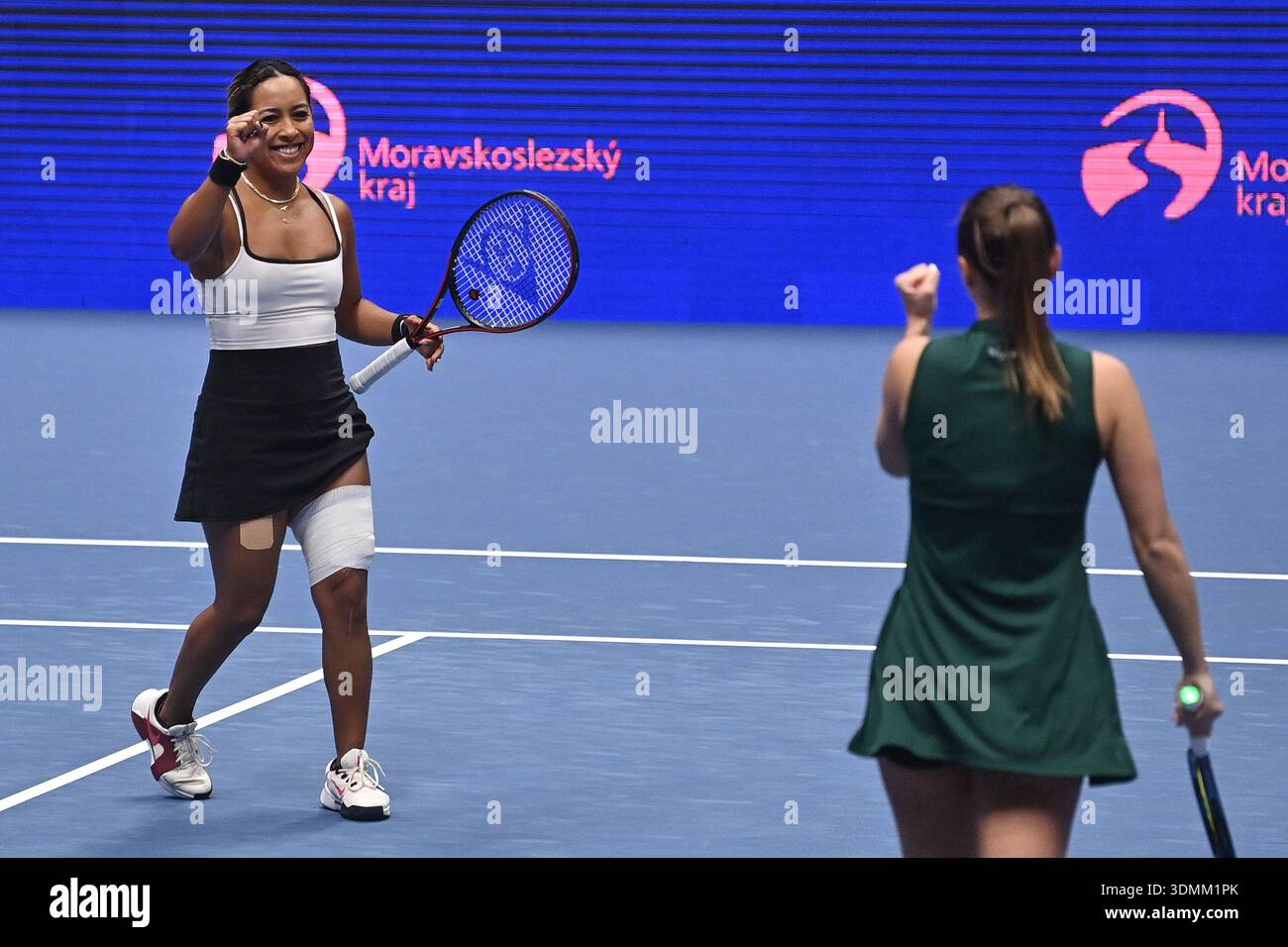 L-R Sabrina Santamari (USA) and Anastasia Detiucova (CZE) celebrate ...
