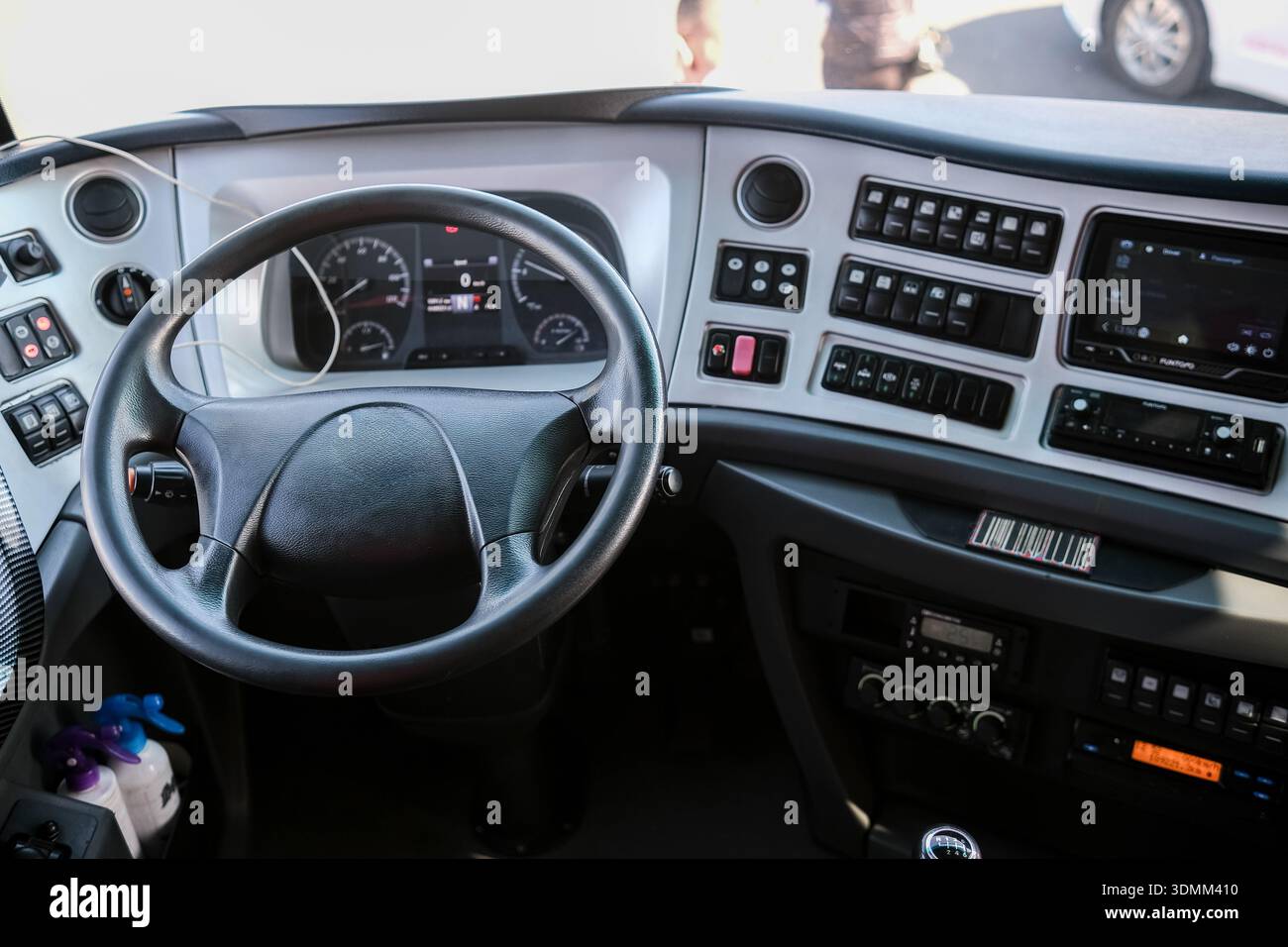 Interior of a modern truck cabin with a steering wheel, dashboard ...