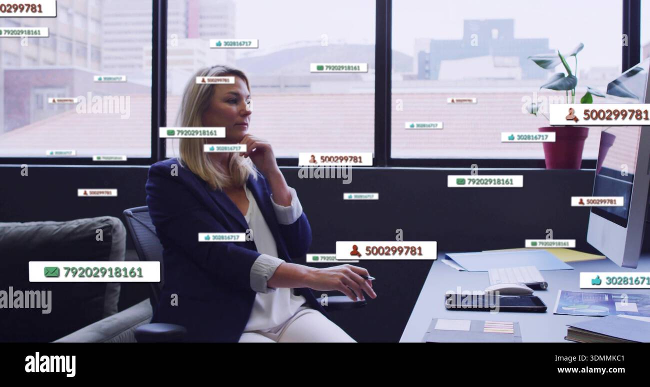 Sitting mature woman in navy blazer, resting chin, using mouse at ...