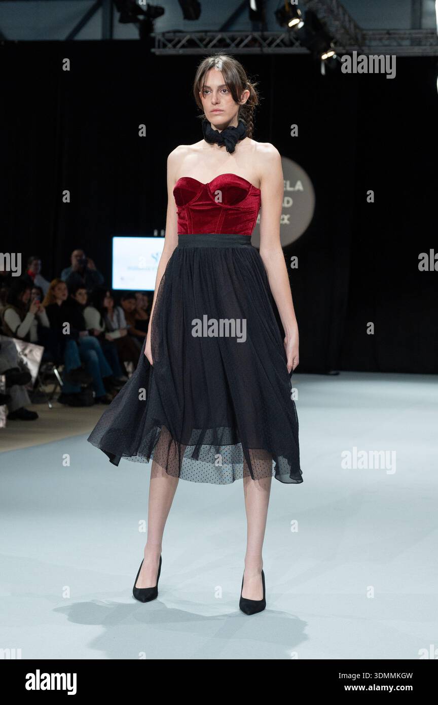 Madrid, Spain. 06th Feb, 2026. A model walks the runway in a design by ...
