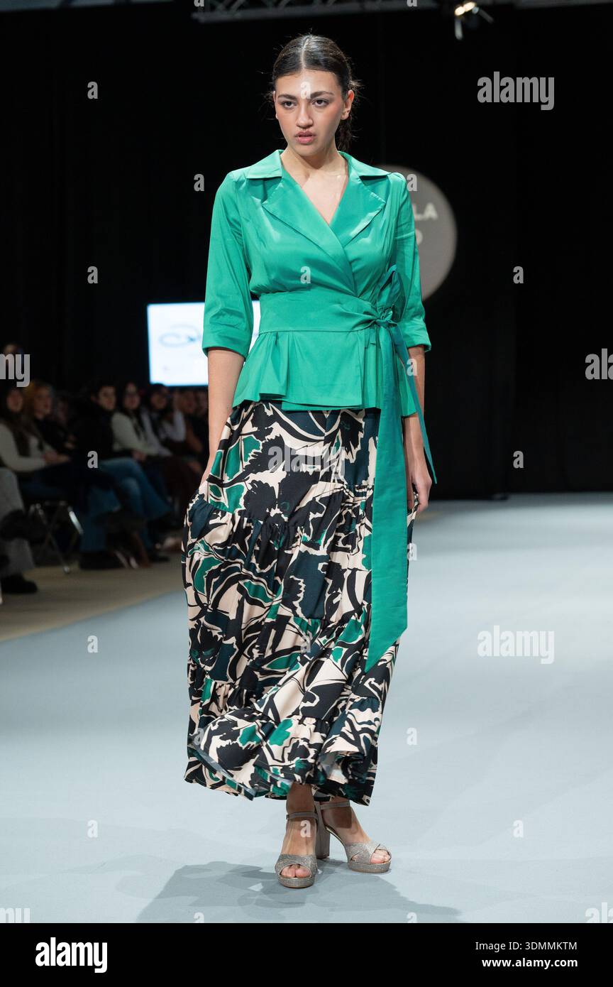Madrid, Spain. 06th Feb, 2026. A model walks the runway in a design by ...