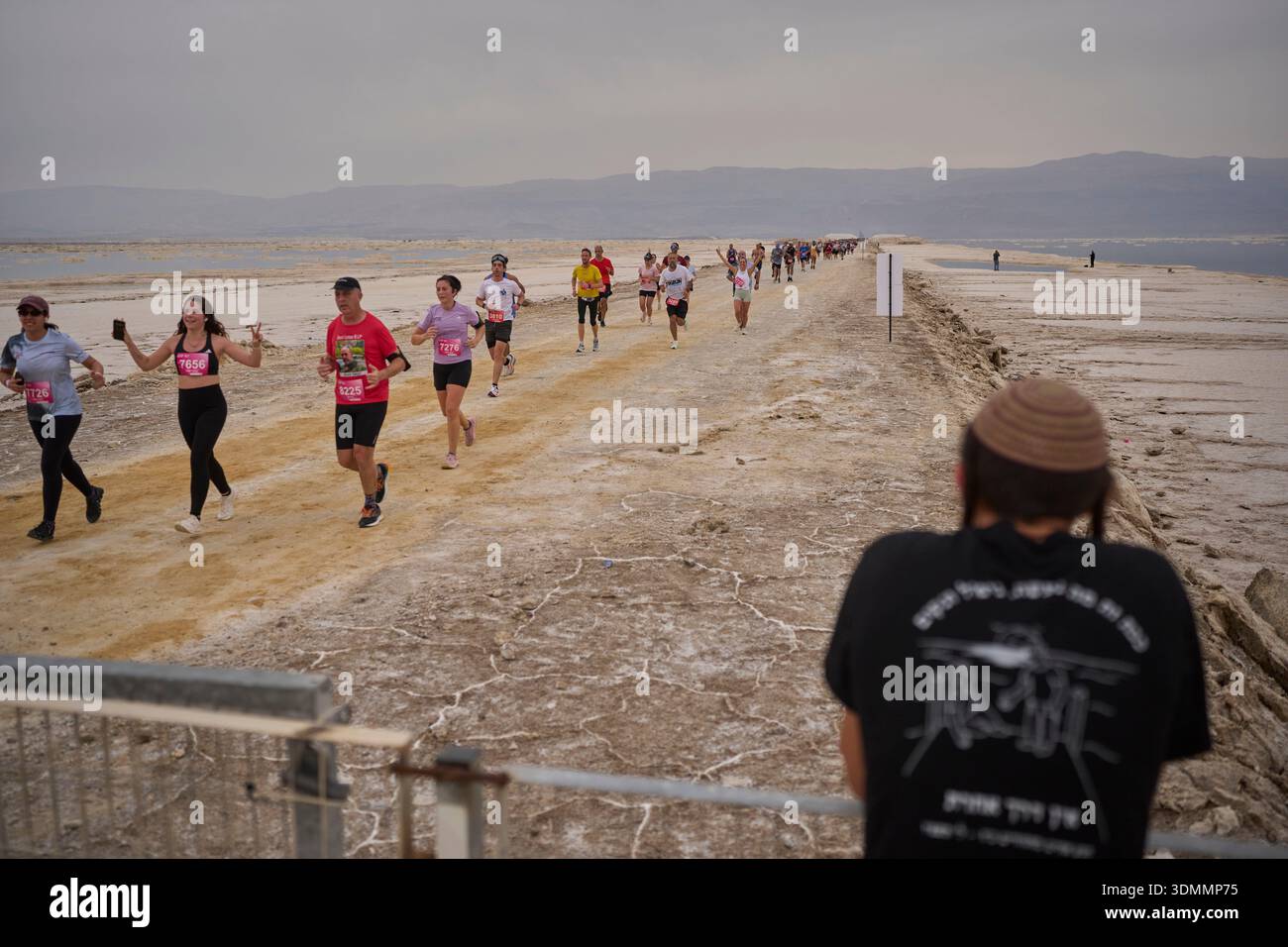 Runners compete in the annual Dead Sea Marathon in Israel, on Friday ...