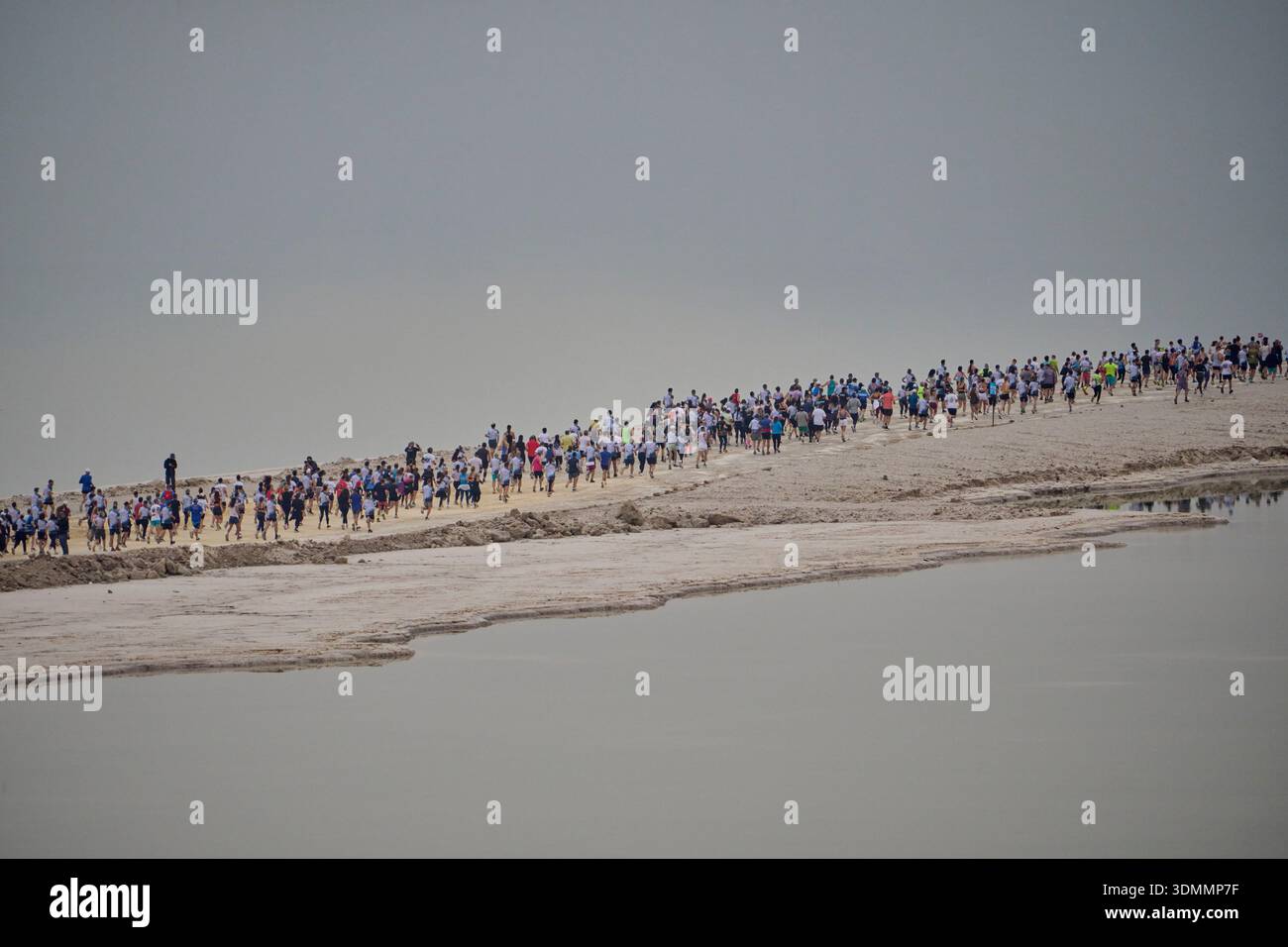 Runners compete in the annual Dead Sea Marathon in Israel, on Friday ...