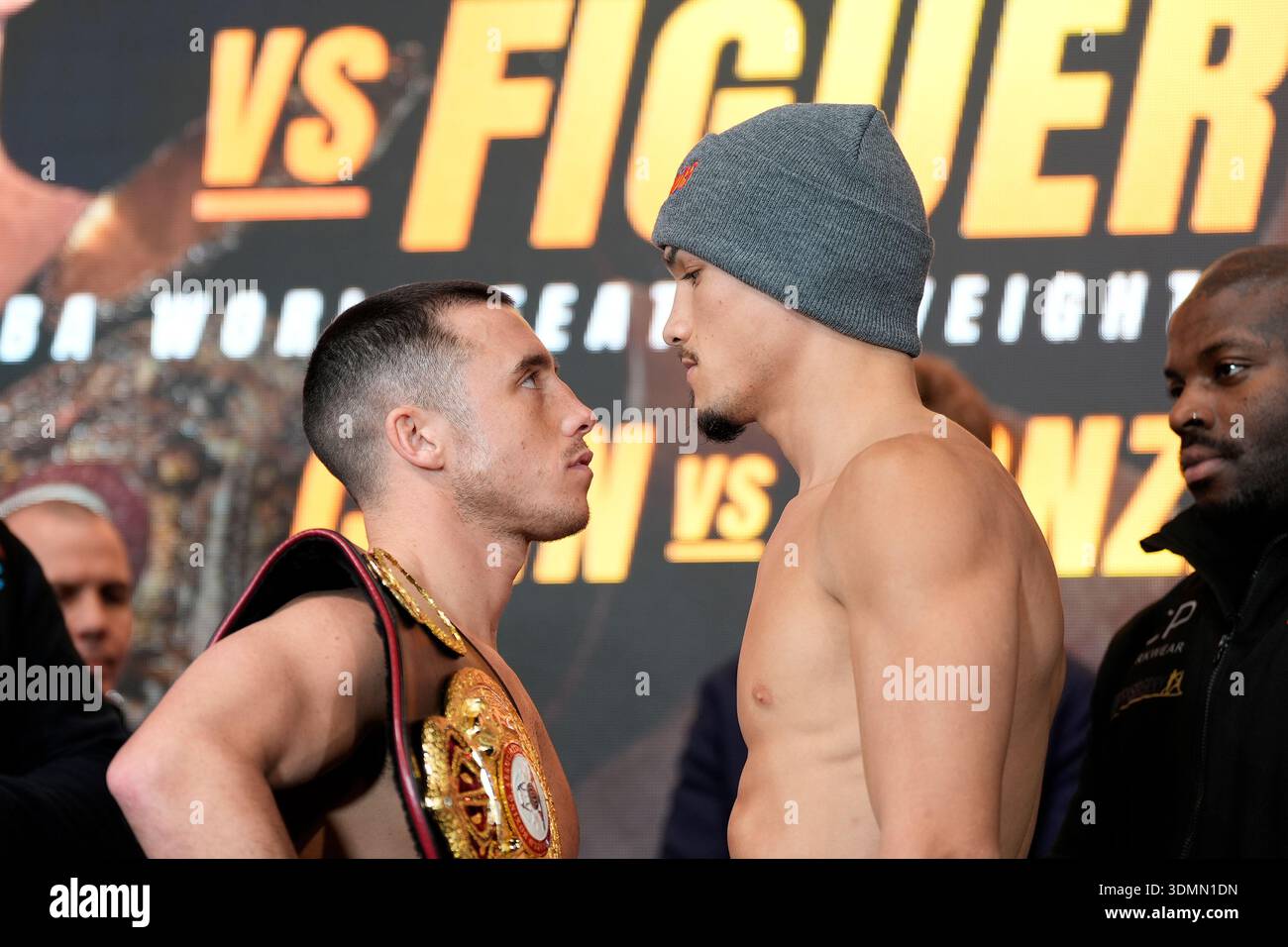 Nick Ball (left) and Brandon Figueroa face off during a weigh-in at ...