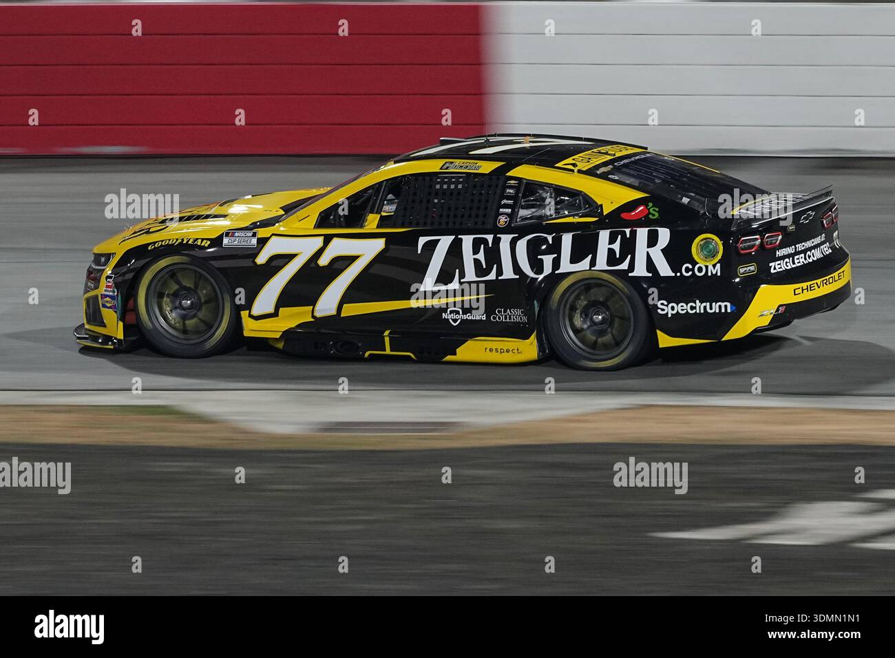 Carson Hocevar steers down the backstretch during NASCAR's The Clash ...