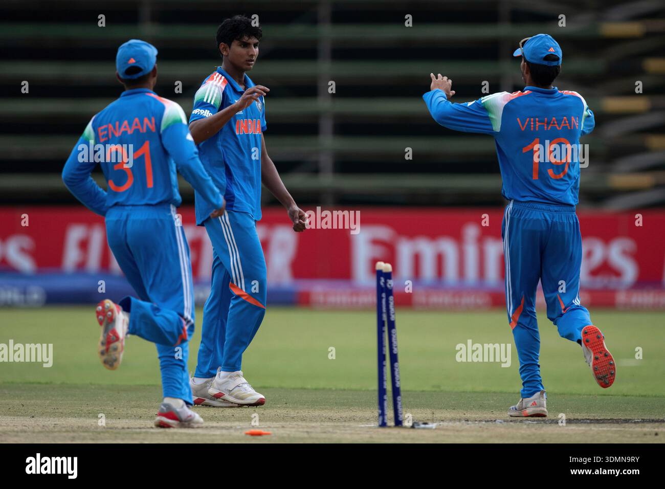 India's bowler RS Ambrish, center, celebrates with his teammates after ...