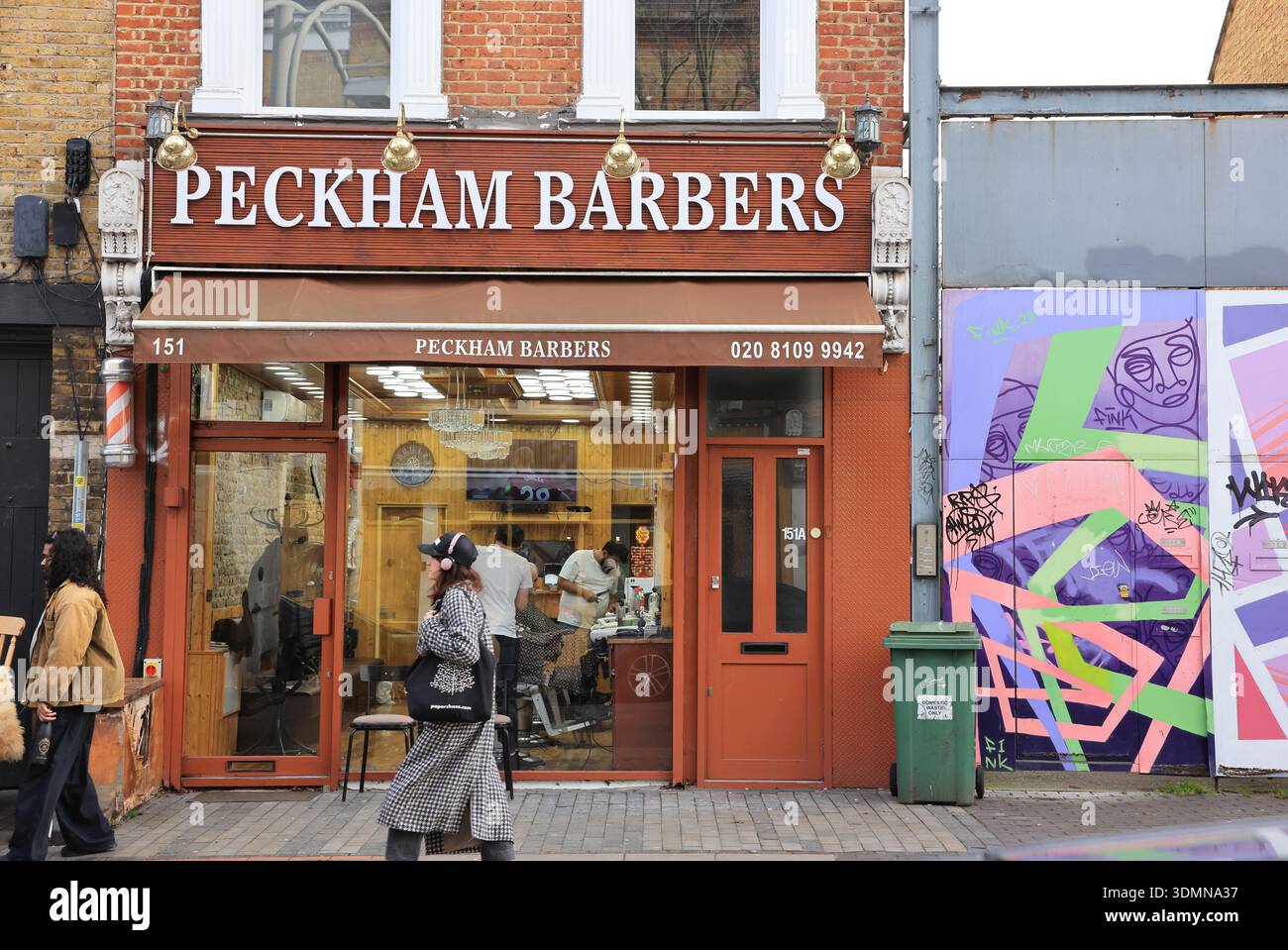 Shops and cafes on trendy Bellenden Road in Peckham, SE London, UK ...