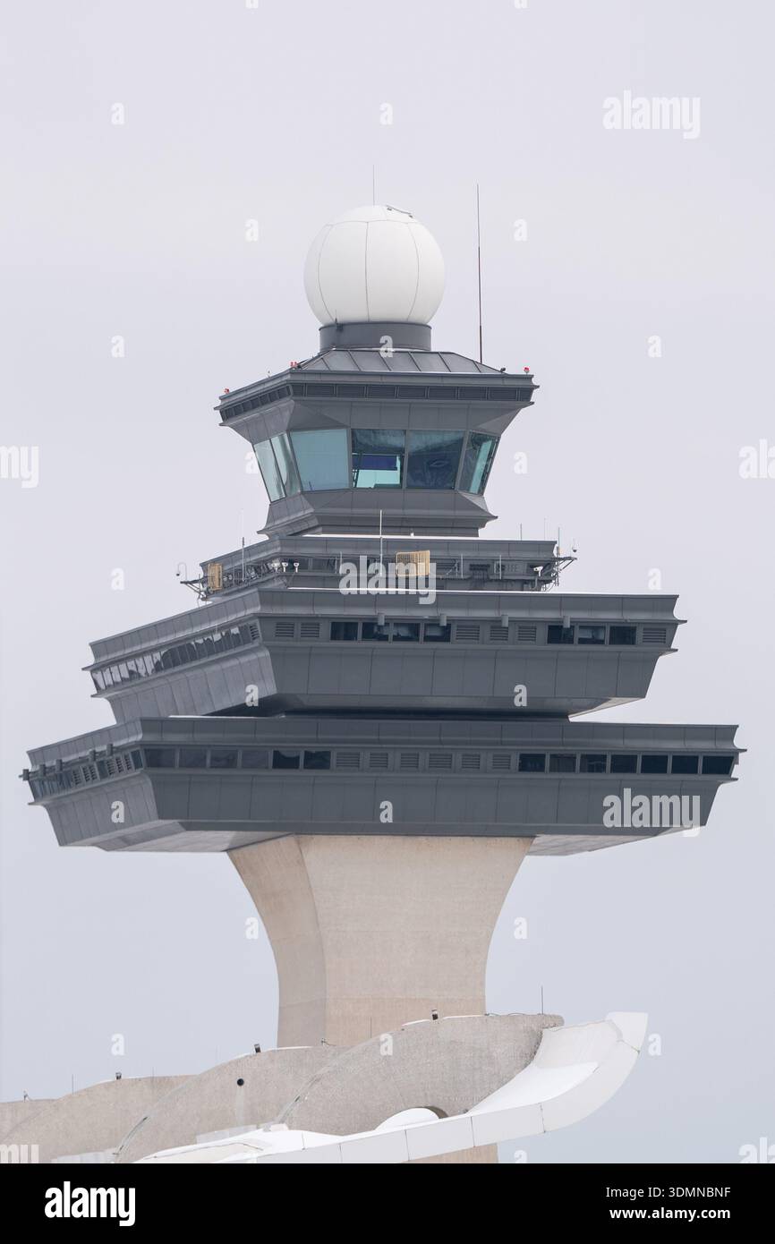 An air traffic control tower is seen at Dulles International Airport ...