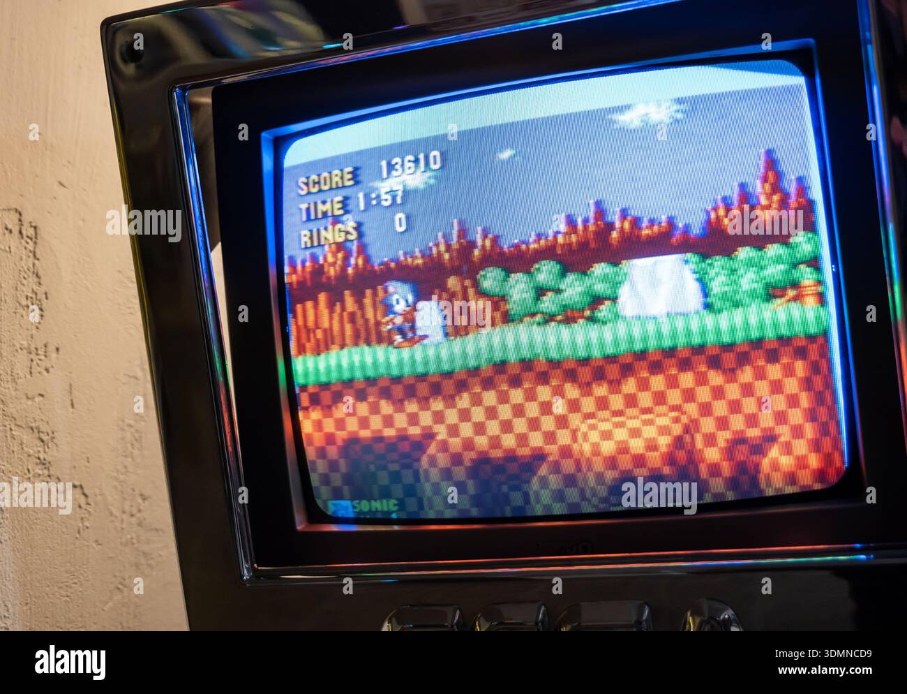 Sega retro platform video game running on vintage CRT TV, angled ...