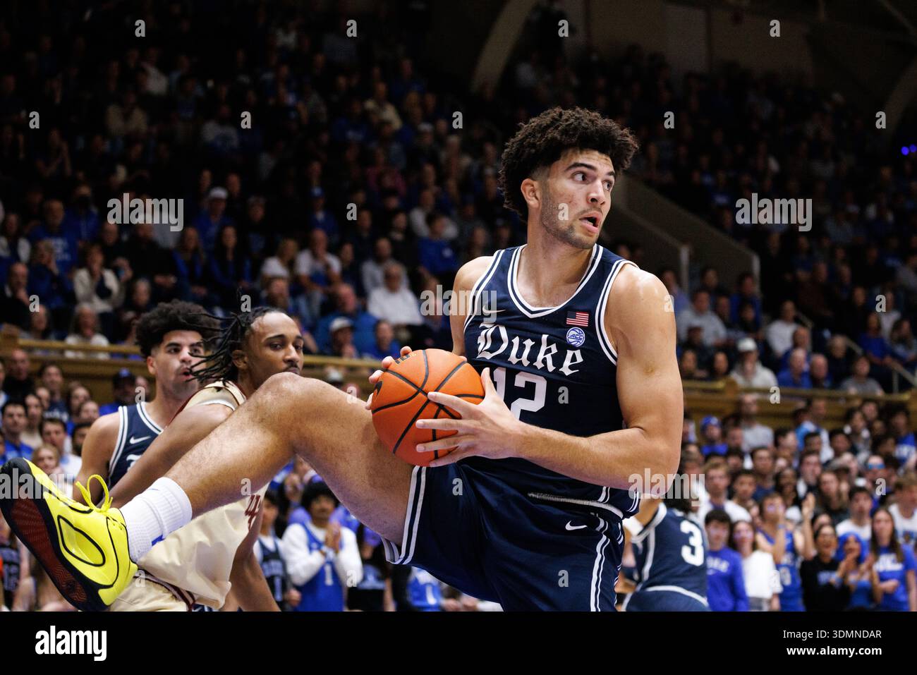 Duke's Cameron Boozer (12) grabs a rebound during an NCAA college ...