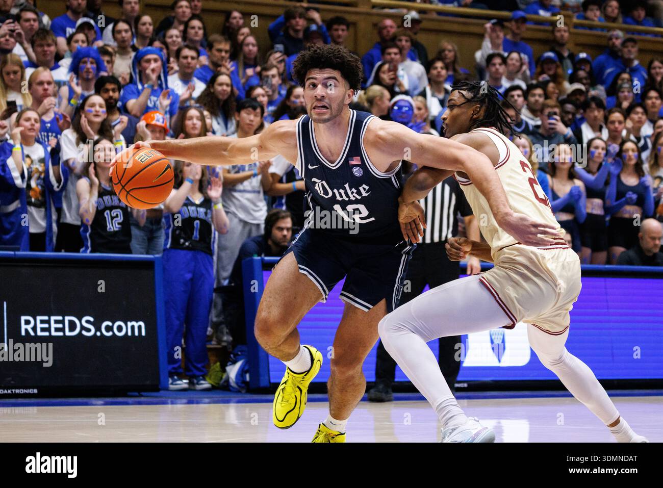 Duke's Cameron Boozer (12) spins around Boston College's Aidan Shaw (23 ...