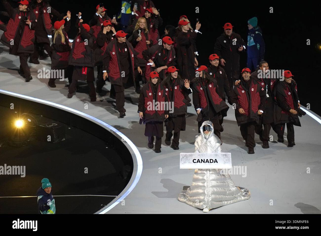 Athletes from Canada attend the Olympic opening ceremony at the 2026 ...