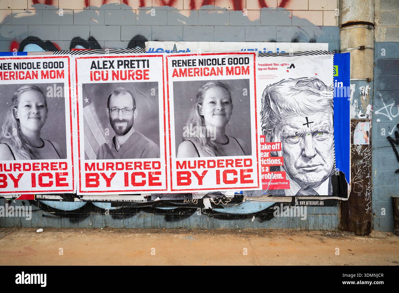Posters of Alex Pretti and Renee Good, both shot and killed by ICE ...