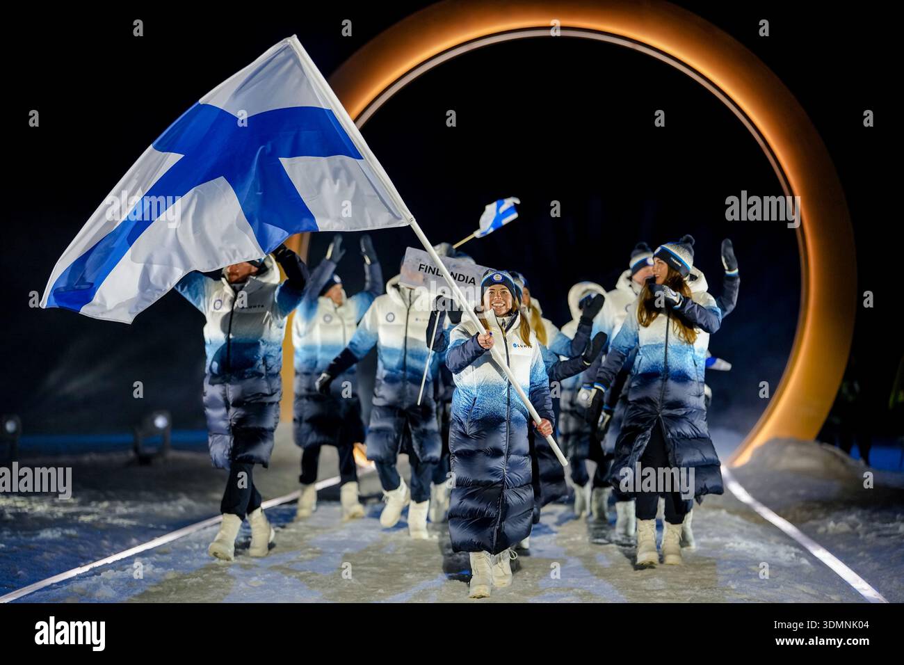 Krista Parmakoski, the flag bearer of Finland, takes part in the ...