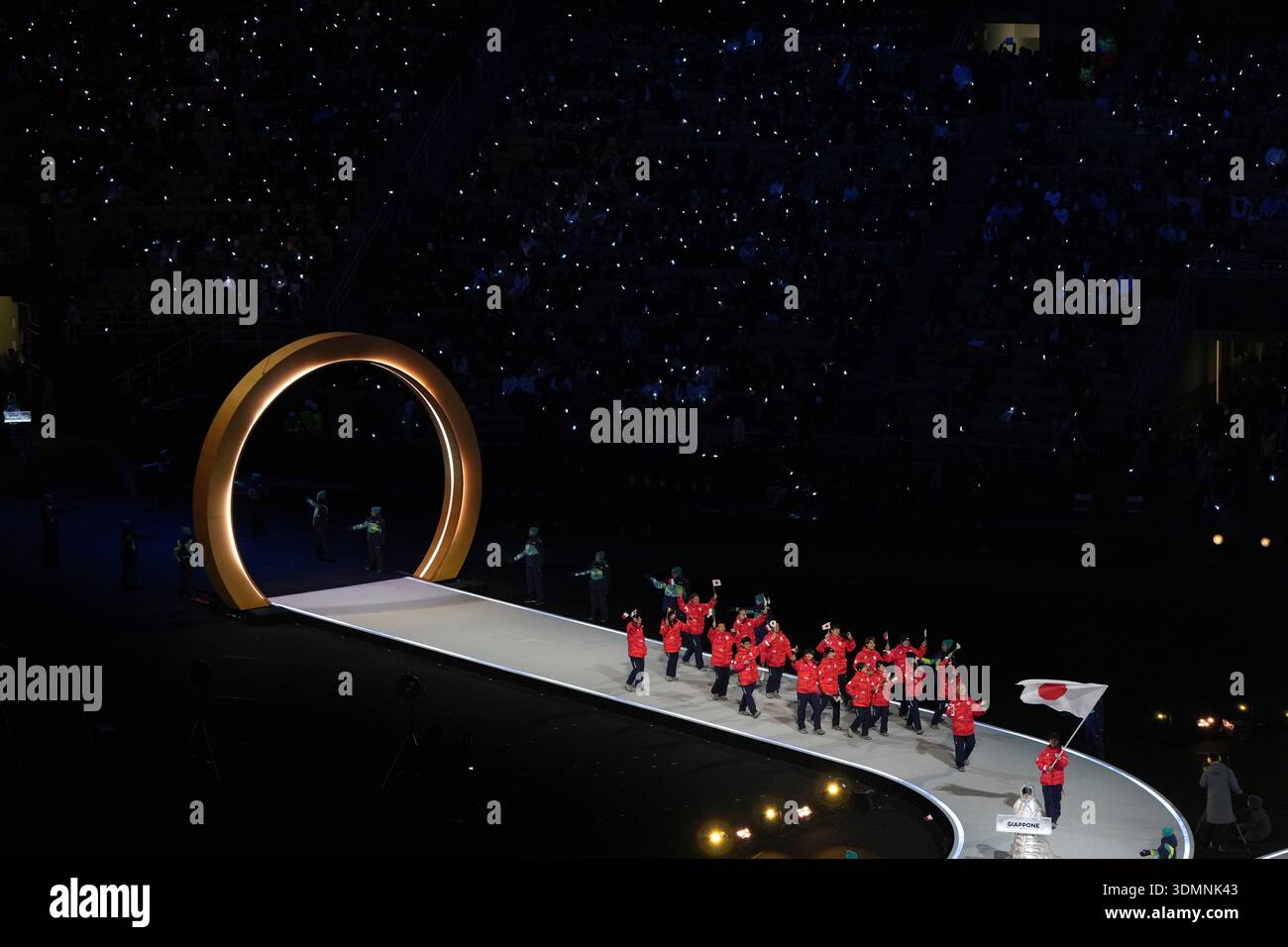 Athletes from Japan attend the Olympic opening ceremony at the 2026 ...