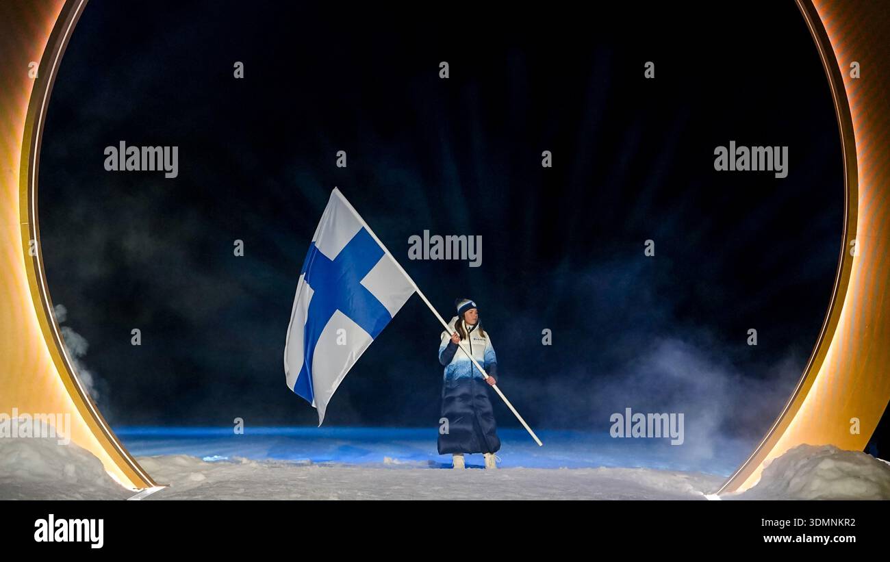 Krista Parmakoski, the flag bearer of Finland, takes part in the ...