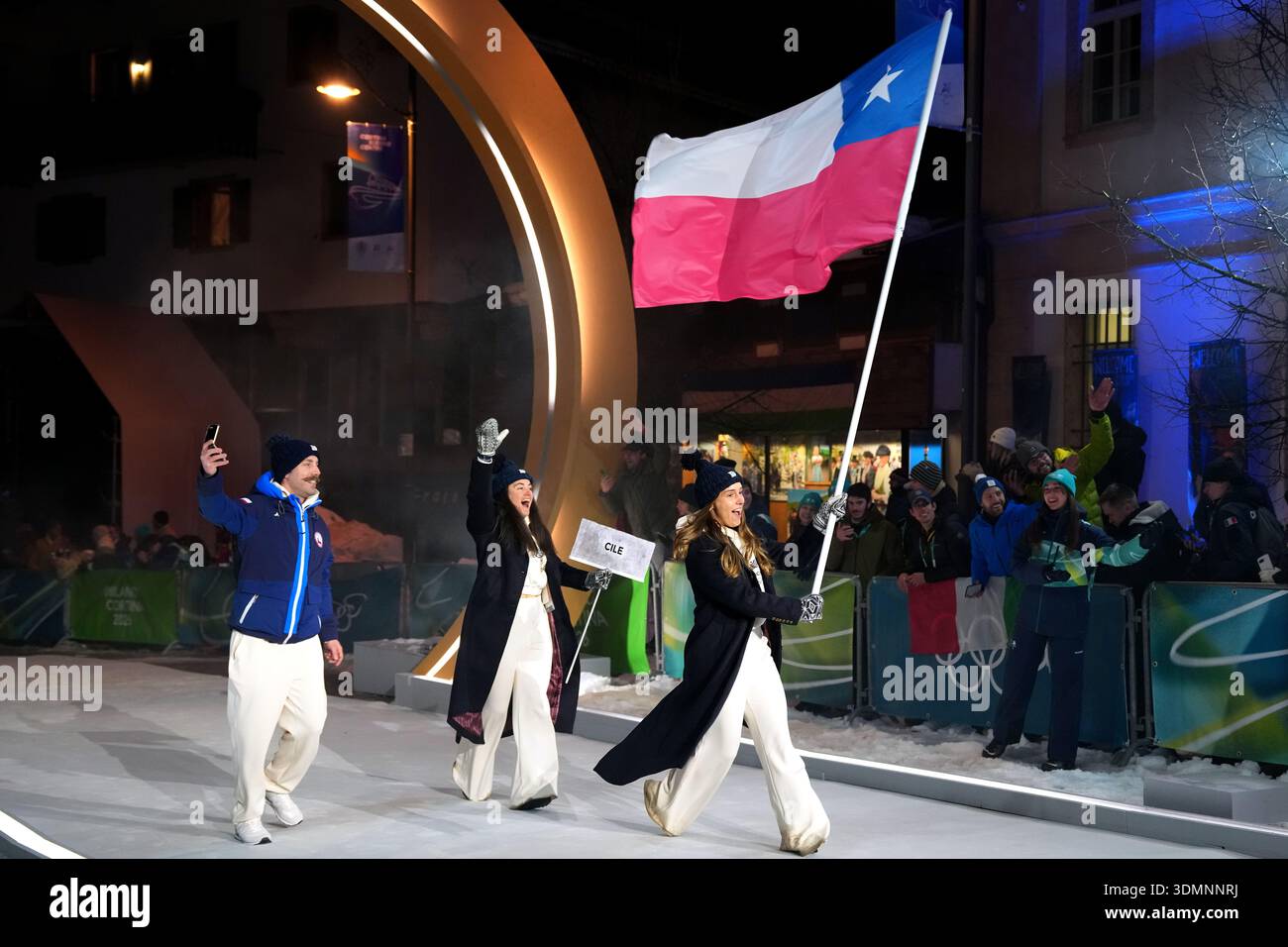 Matilde Schwencke, flag bearer of Chile, leads her team in during the ...