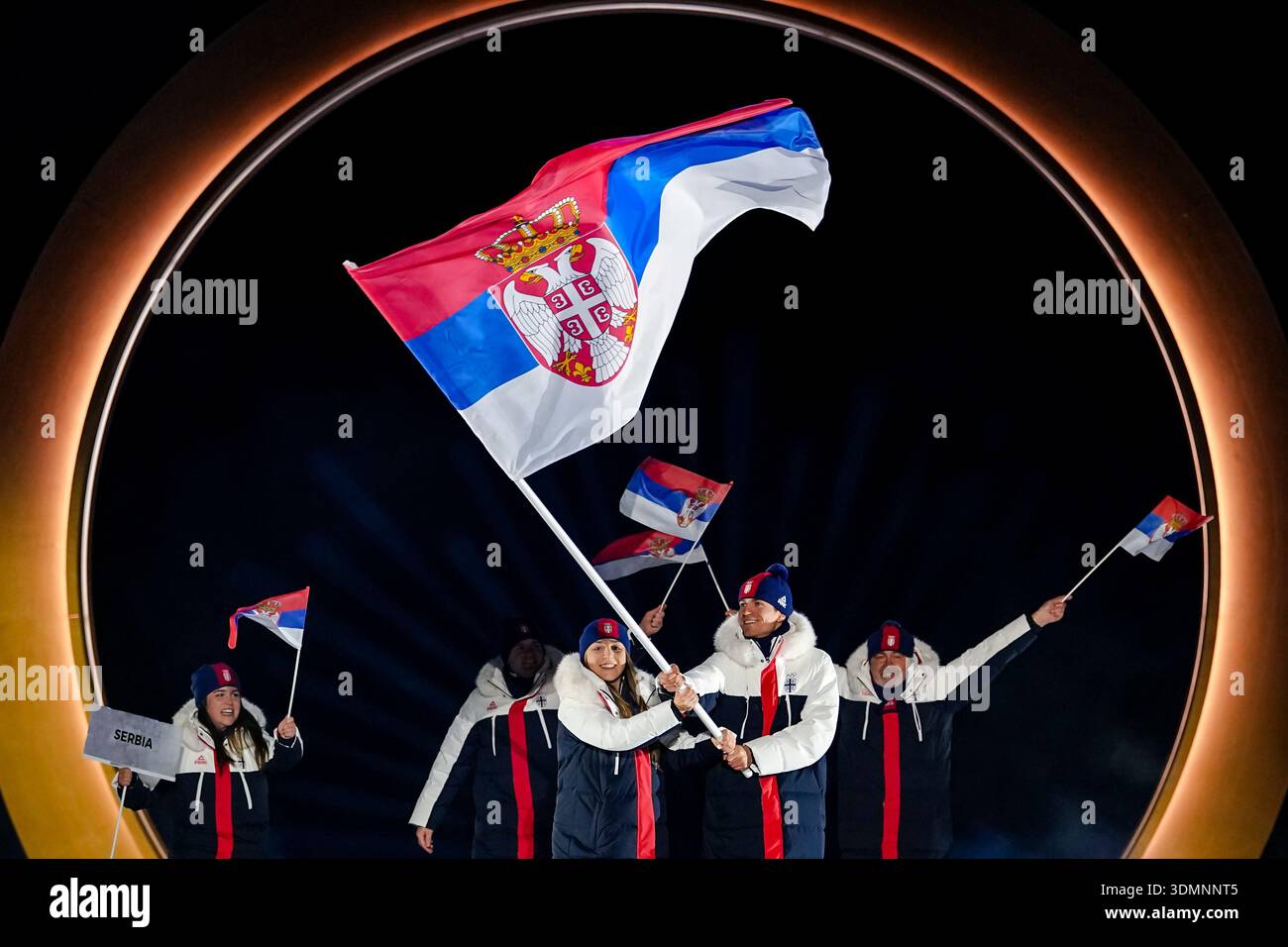 Anja Ilic and Milos Milosavljevic, the flag bearers of Serbia, take ...
