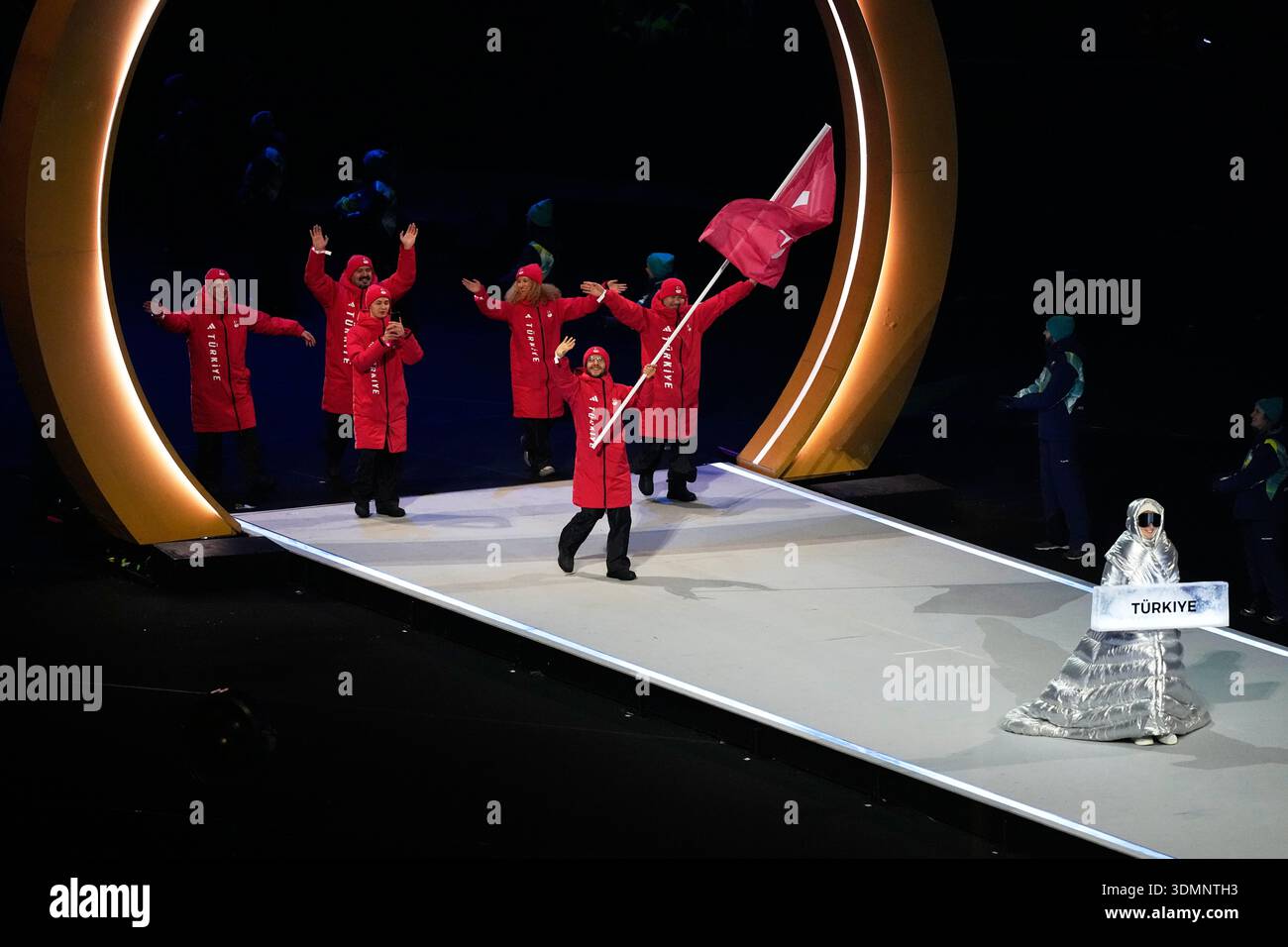 Athletes from Turkey attend the Olympic opening ceremony at the 2026 ...