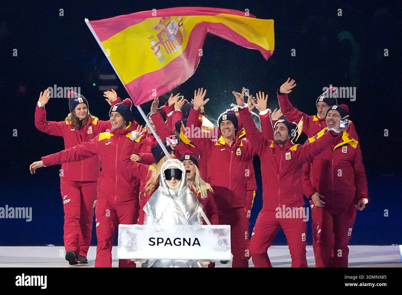 Spain athletes wave as they walk during the Olympic opening ceremony at ...