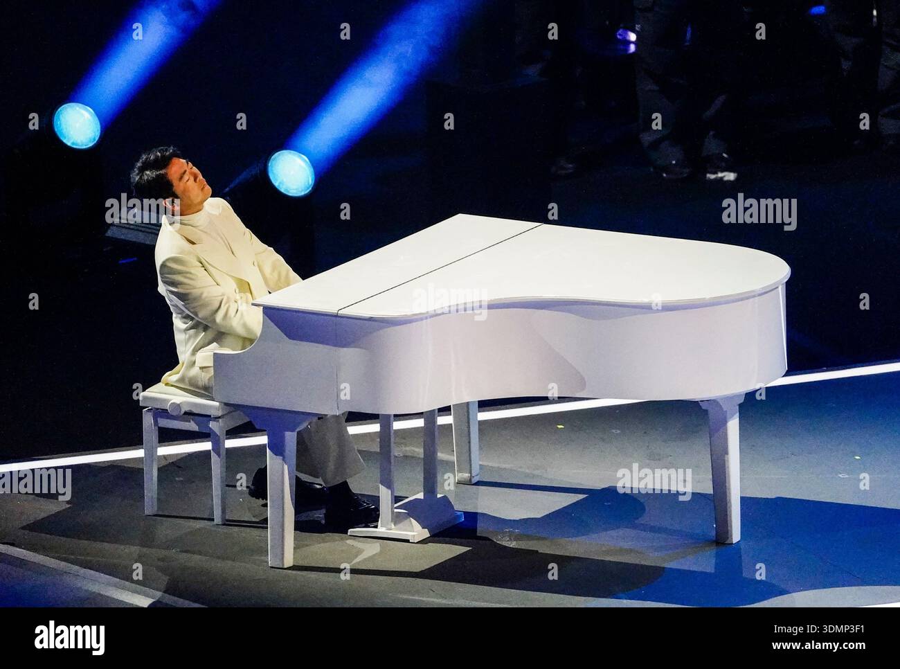 Iianist Lang Lang performs during the Opening Ceremony of the Milano ...