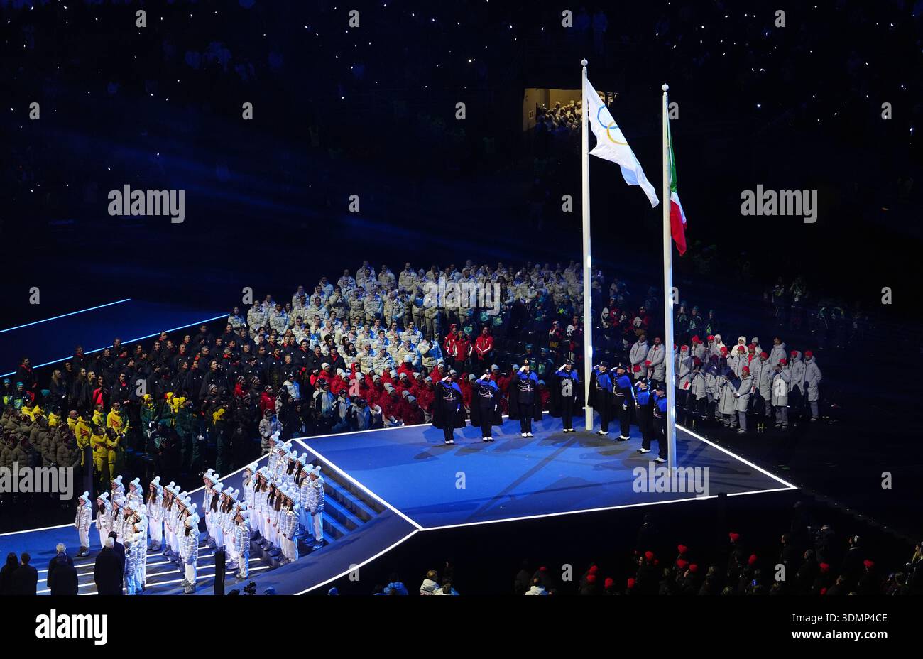 The Olympic flag is raised during Opening Ceremony for the Milano ...