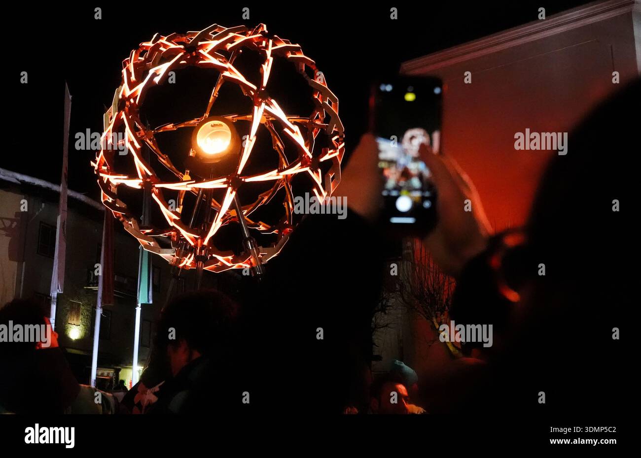 The Olympic flame in the Olympic cauldron at the Cortina d'Ampezzo ...