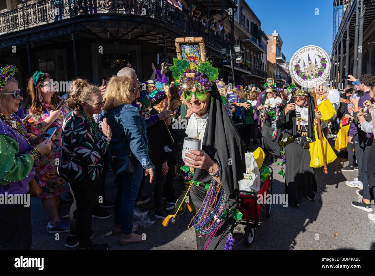 Attendees march during the annual Krewe de Cork parade during the Mardi ...