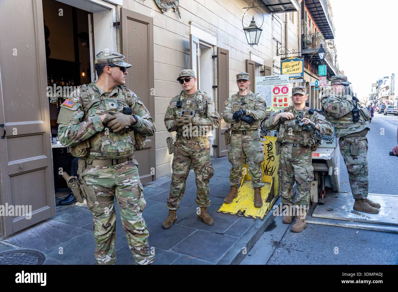 National guard soldiers keep watch during the annual Krewe de Cork ...