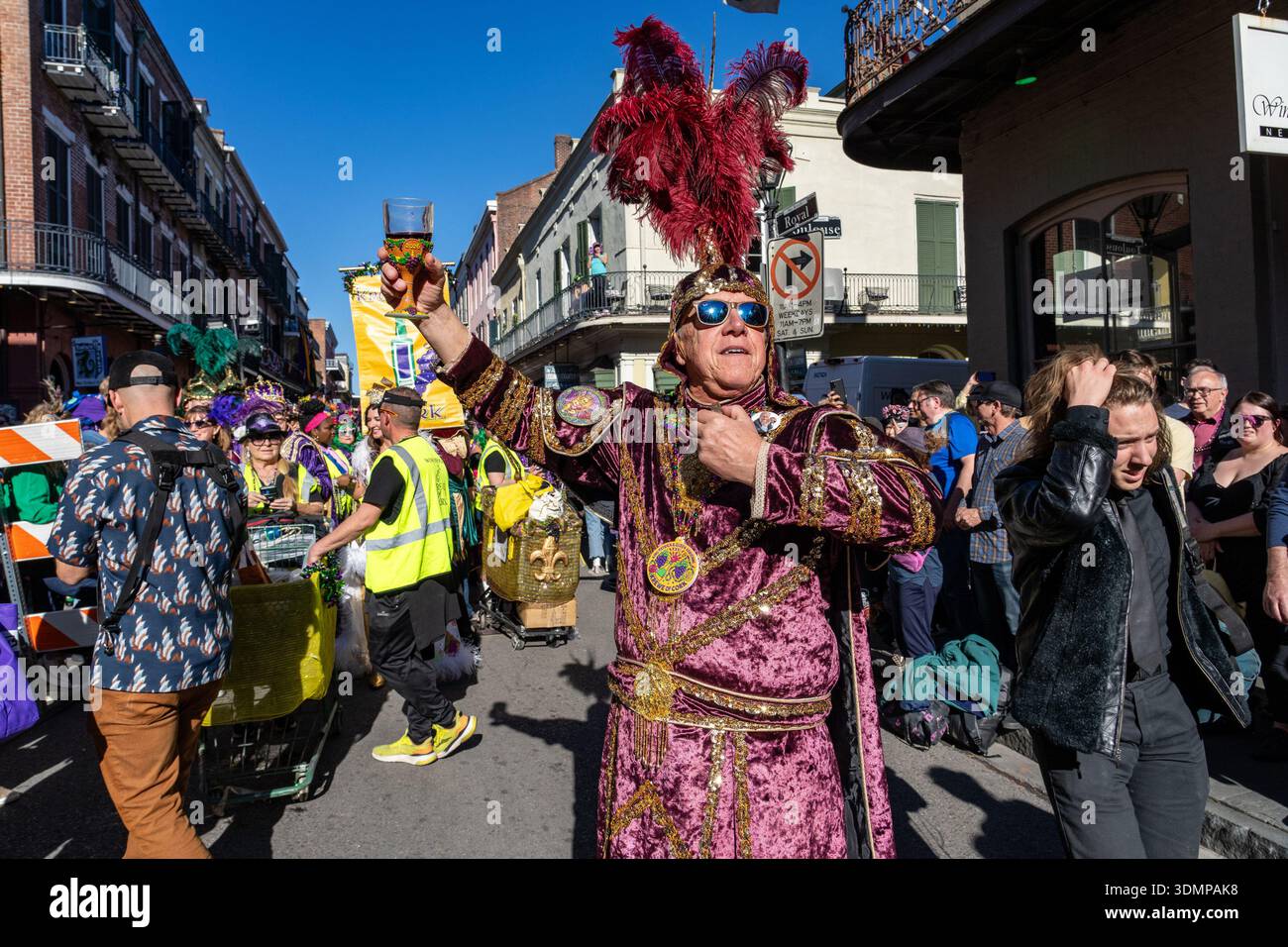 Attendees march during the annual Krewe de Cork parade during the Mardi ...