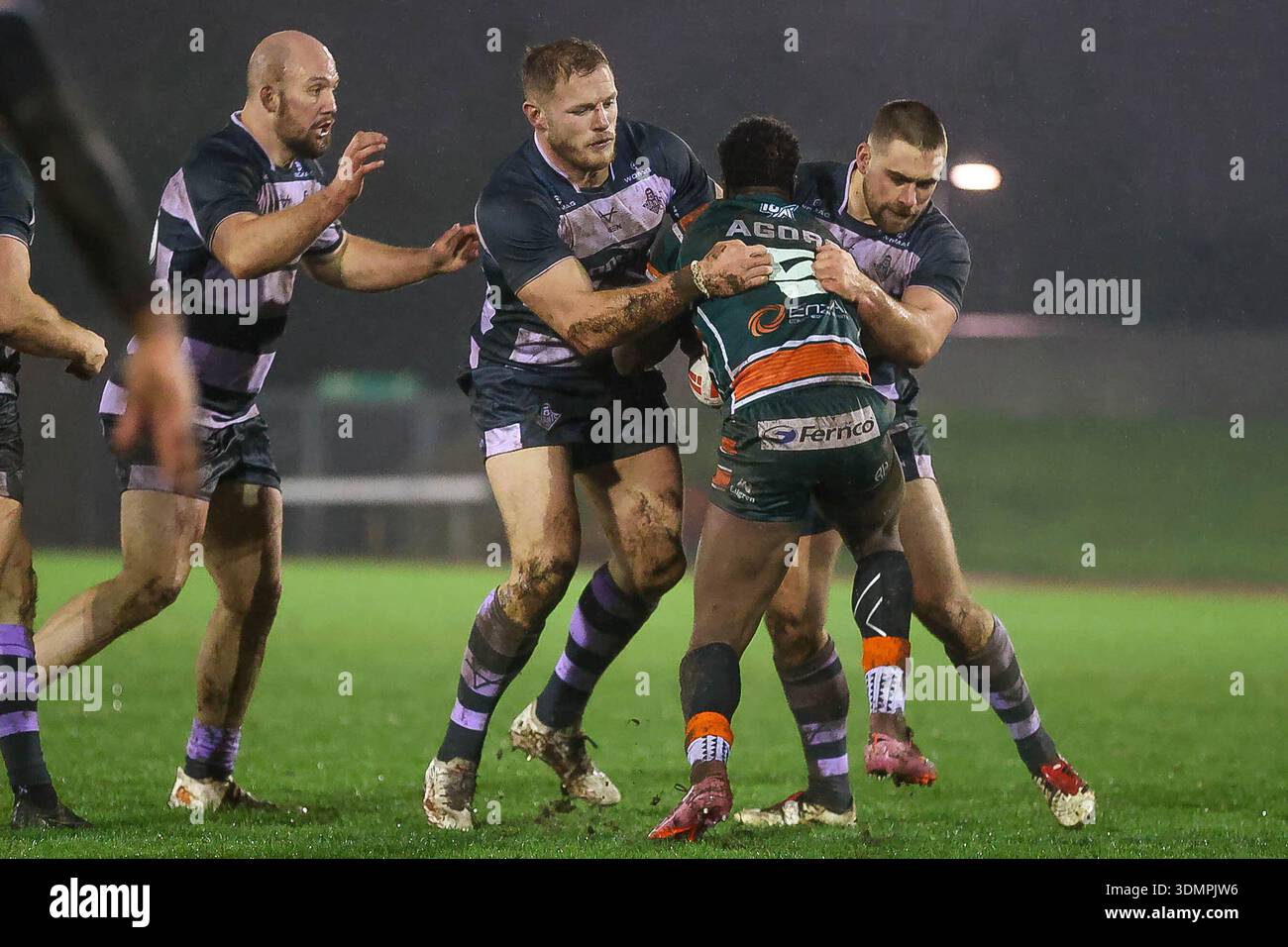 Mo Agoro is tackled by Tom Burgess Sam Hewitt and George King during ...