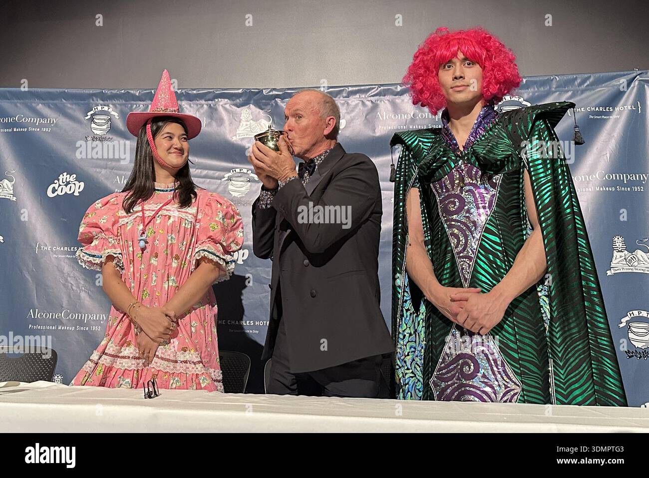 Michael Keaton holds up his Pudding Pot that he received after being ...