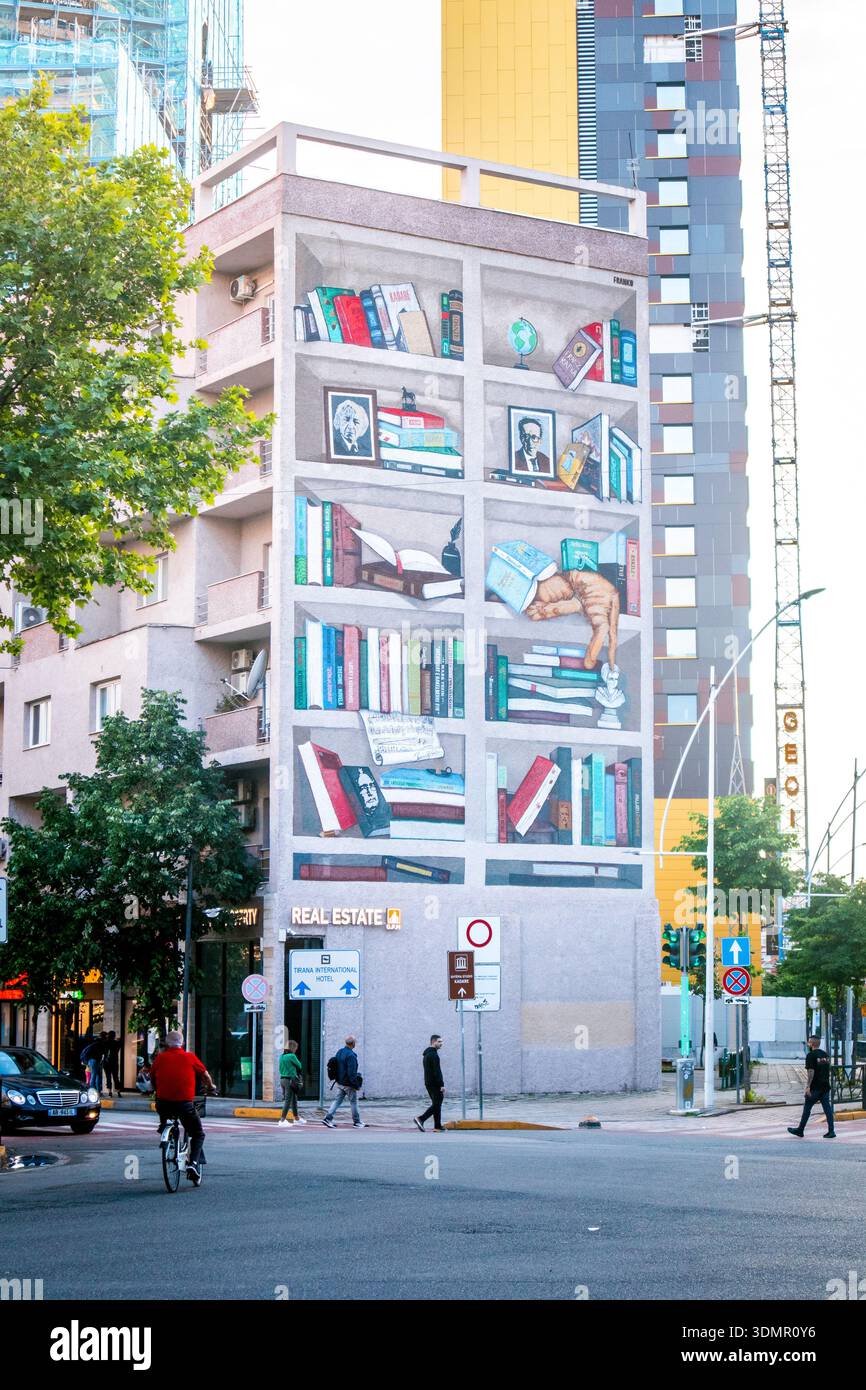 Buildings and street art representing books and shelves from a library ...