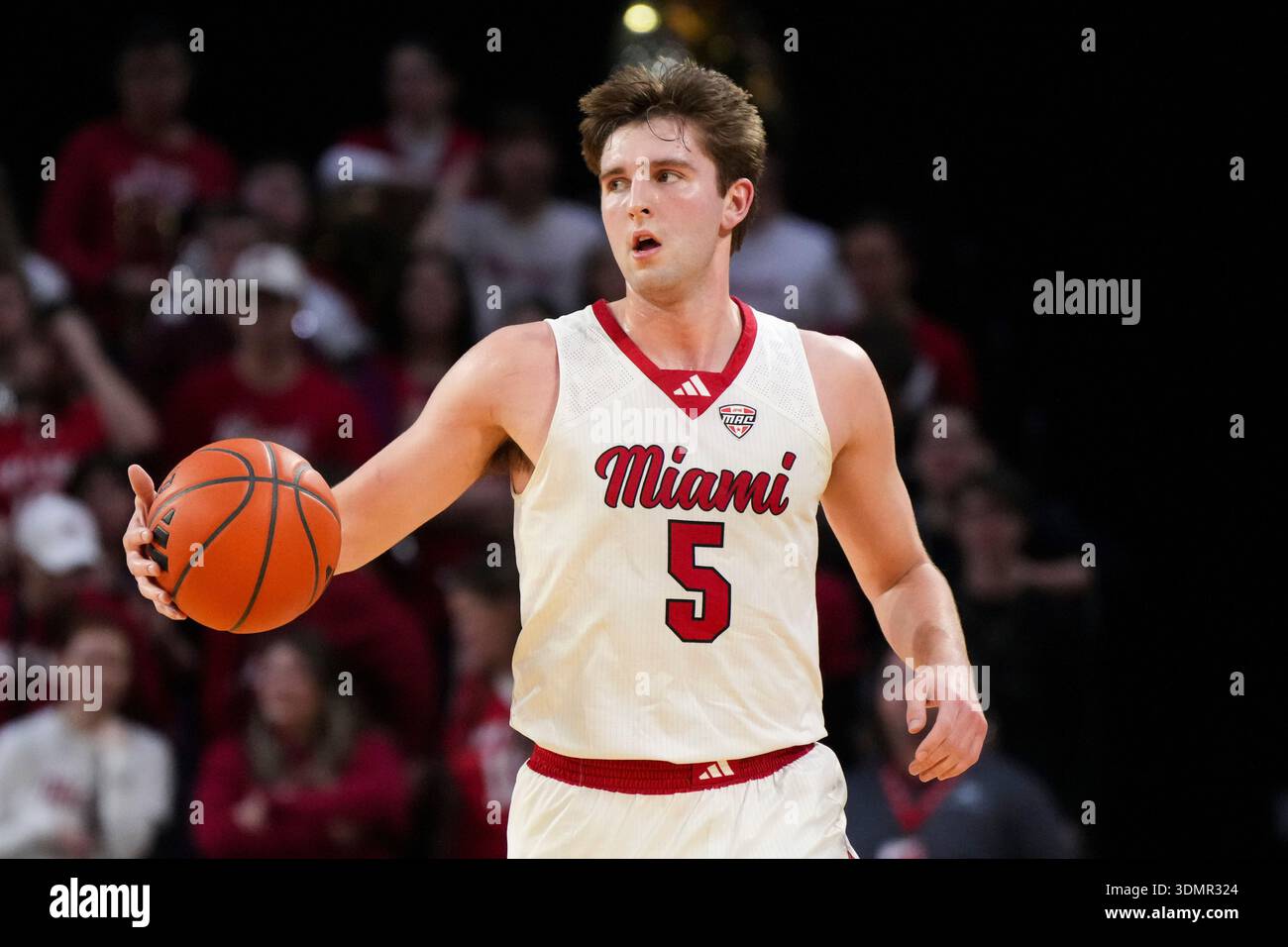 Miami (OH) guard Peter Suder (5) controls the ball during an NCAA ...