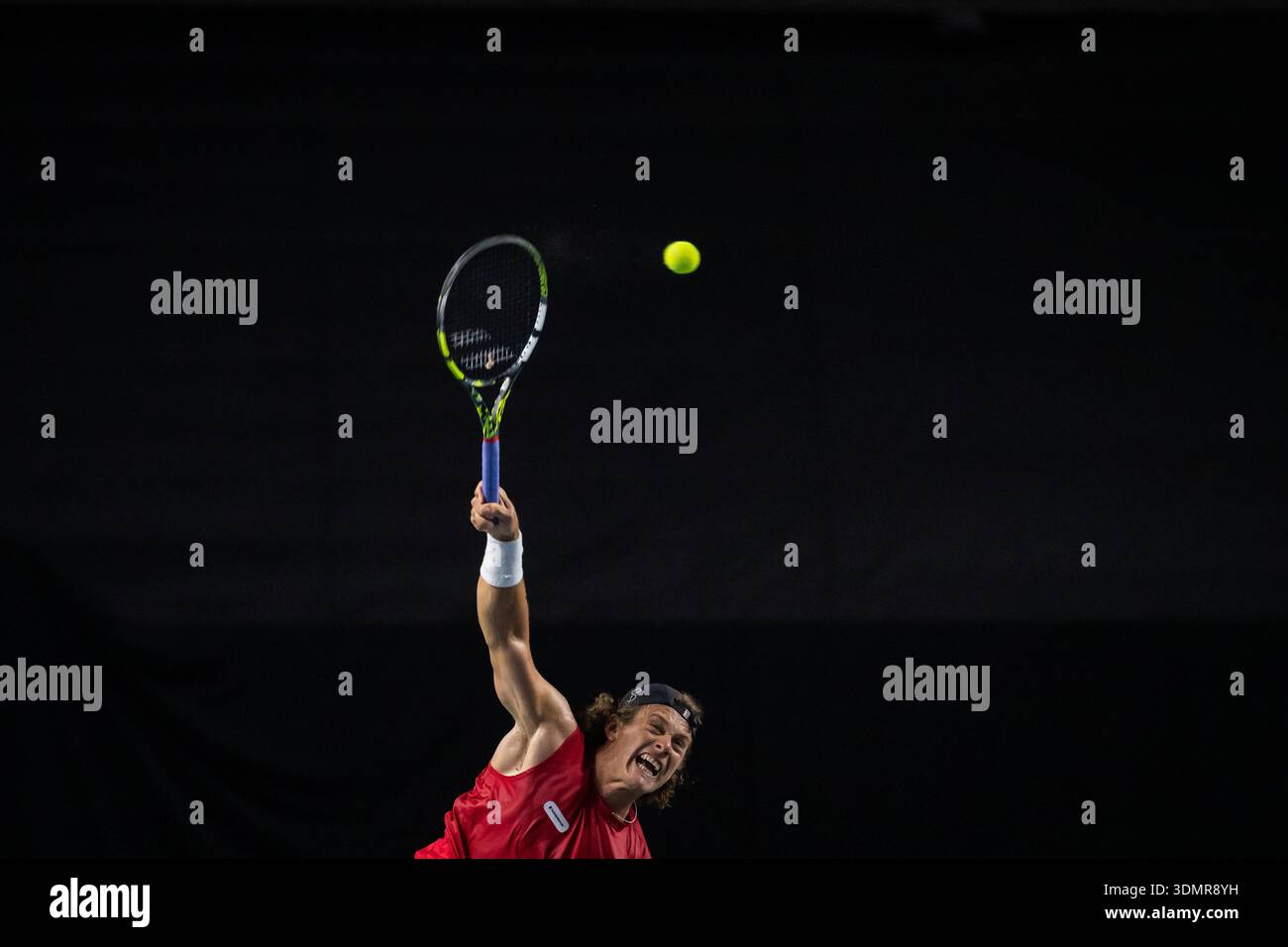 Canada's Liam Draxl serves to Brazil's Joao Lucas Reis Da Silva during ...