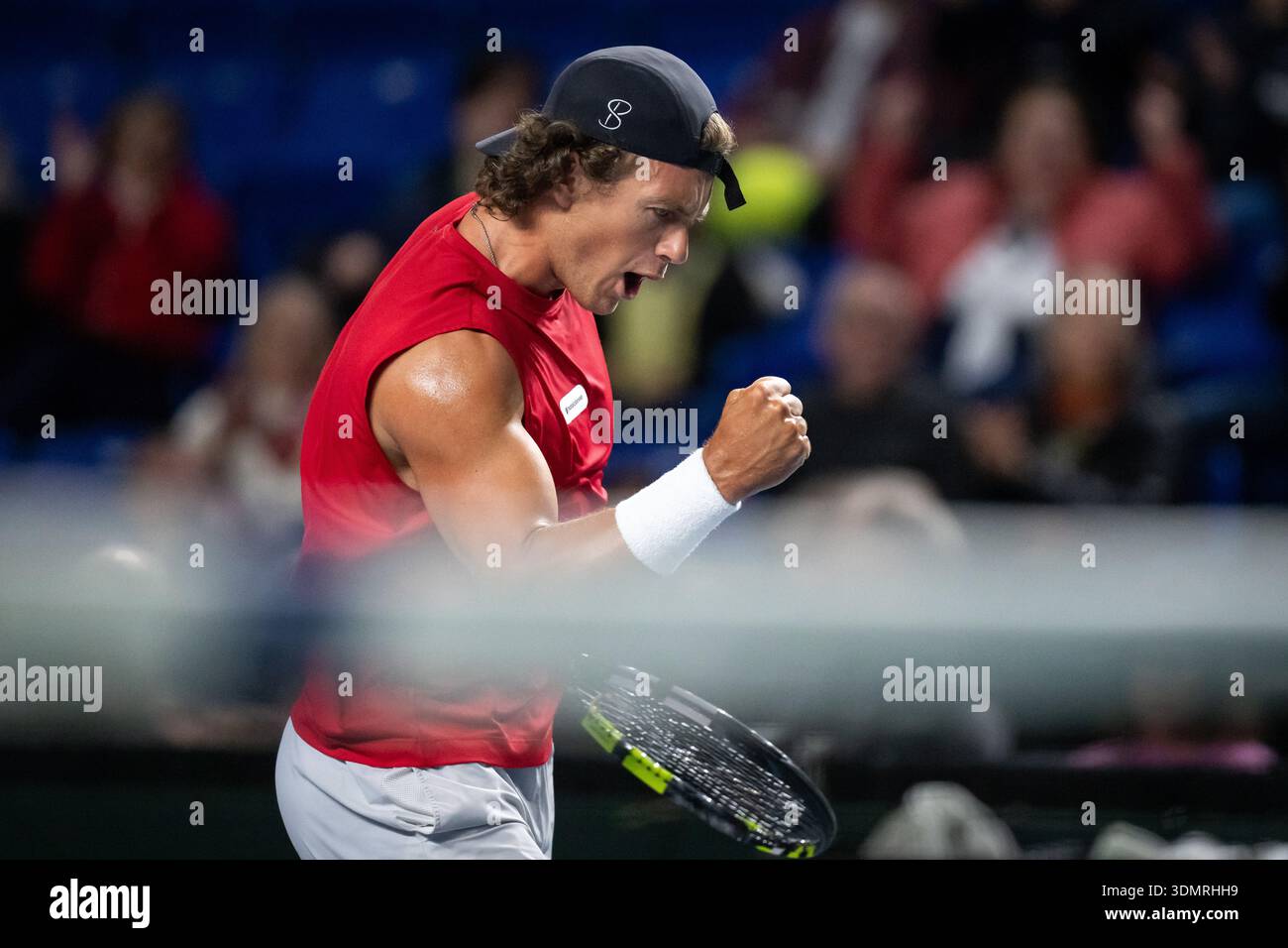 Canada's Liam Draxl celebrates winning a point against Brazil's Joao ...