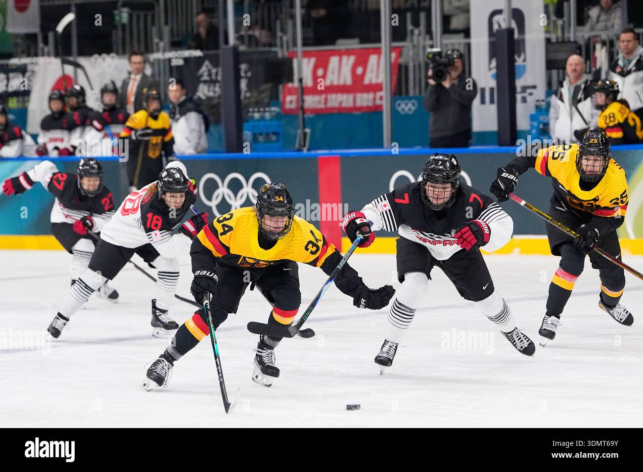 Japan's Kanami Seki, center right, challenges Germany's Laura Kluge ...