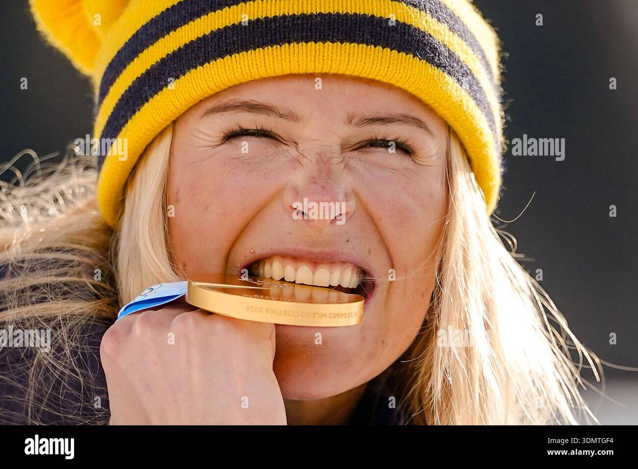 Frida Karlsson of Sweden poses with her gold medal after the cross ...