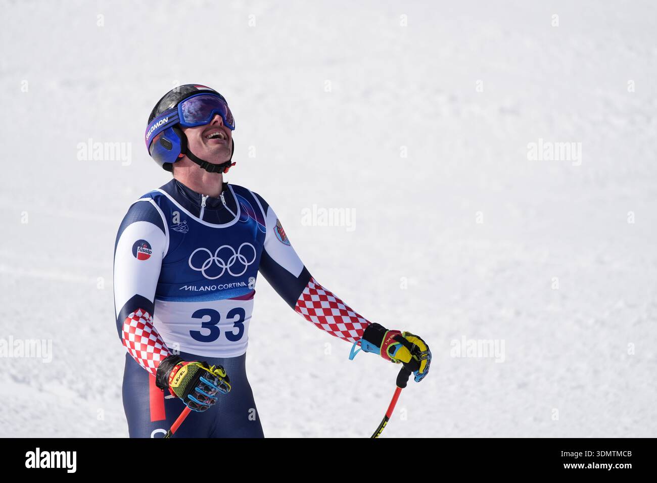Monaco's Arnaud Alessandria reacts at the finish area of an alpine ski ...