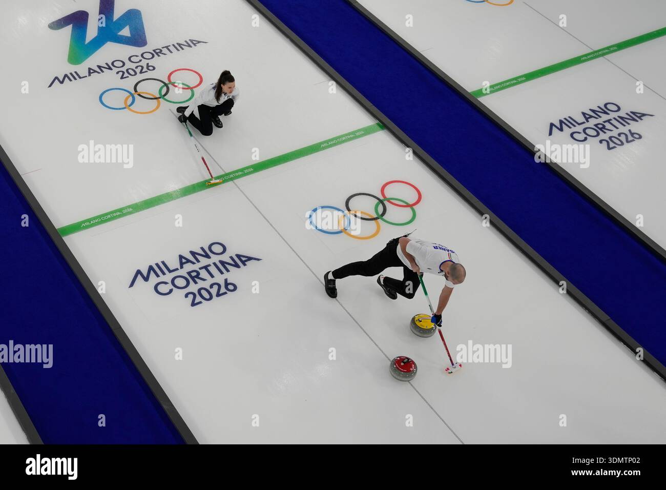 Italy's Amos Mosaner and Stefania Constantini compete during a curling ...